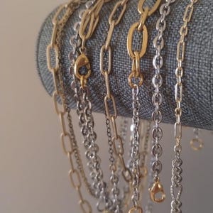 Mixed Metal Chains and Link Bracelets Layering Jewelry Gold and Silver ...