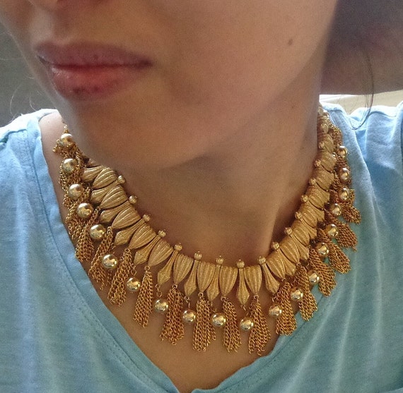 TRIFARI book illustrated bib necklace in textured and… - Gem
