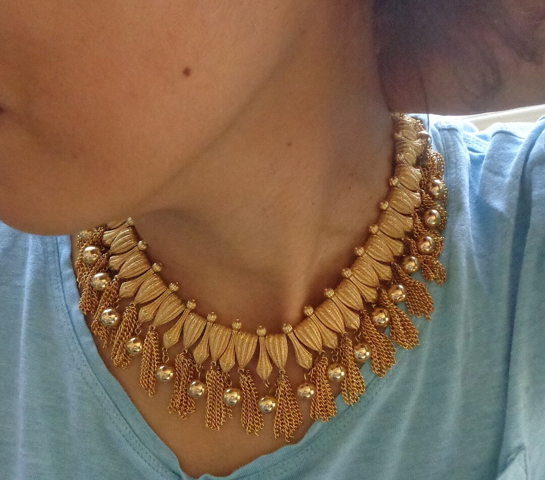 TRIFARI Book Illustrated Bib Necklace in Textured and Glossy Gold Tone ...