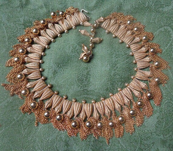 TRIFARI book illustrated bib necklace in textured and… - Gem