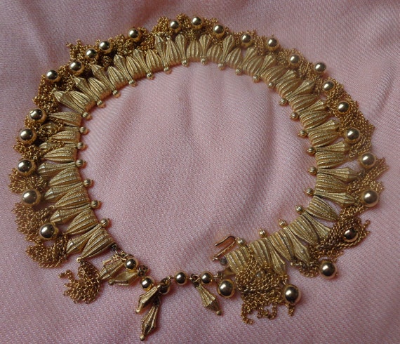 TRIFARI book illustrated bib necklace in textured and… - Gem