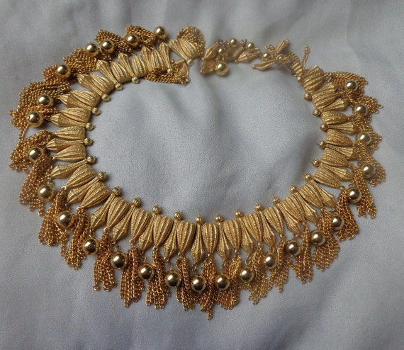 TRIFARI book illustrated bib necklace in textured and… - Gem