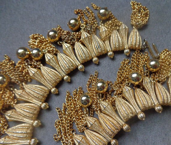 TRIFARI book illustrated bib necklace in textured and… - Gem