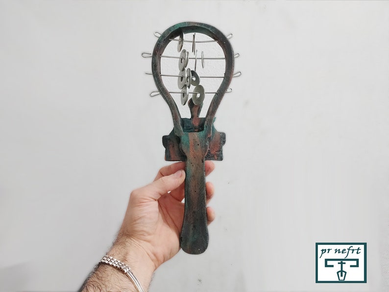The Sistrum of the Goddess Hathor. the Ancient Egyptian Sistrum. A ...