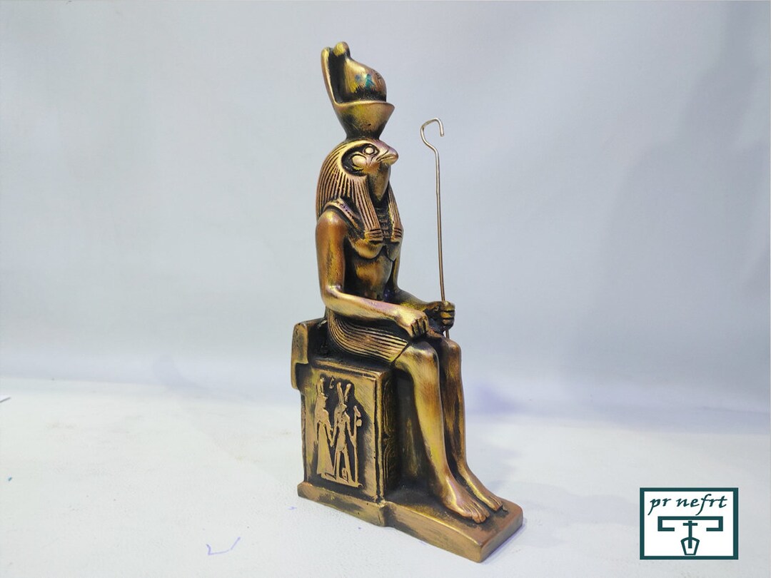 A Seated Statue of the God Horus. the God Horus, the God of Revenge ...