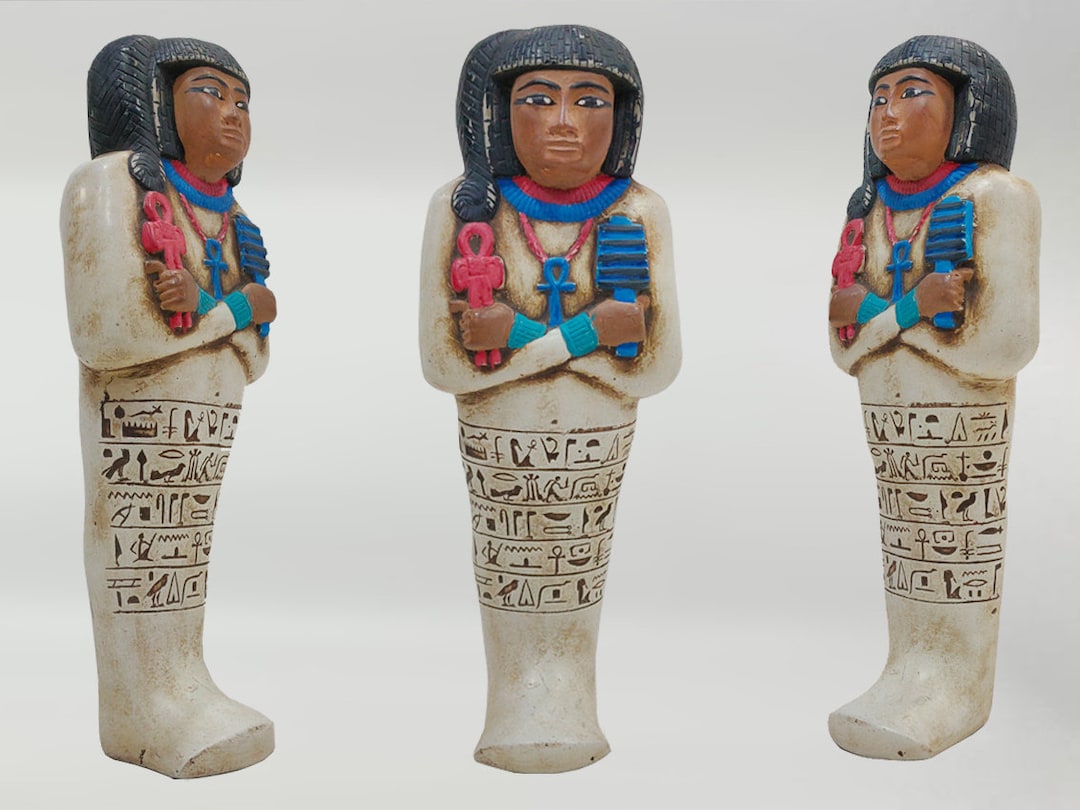 Statue of the Egyptian Pharaoh. It Bears an Isis Knot and a Djed Column ...