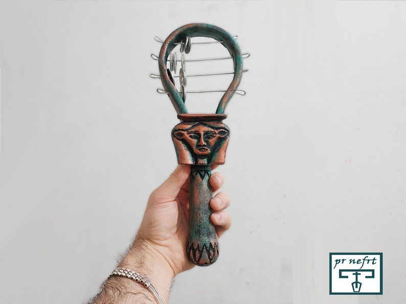 The Sistrum of the Goddess Hathor. the Ancient Egyptian Sistrum. A ...