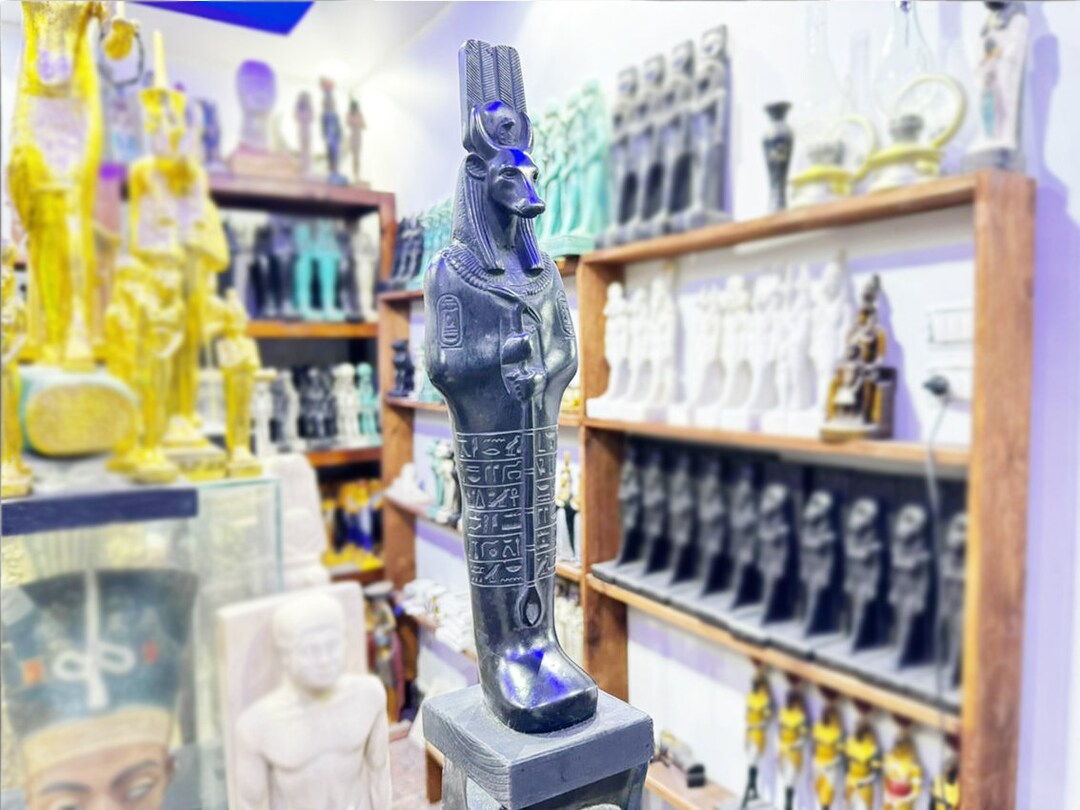 Statue of the God of War Montu. Human Body and Bull's Head. He Holds a ...