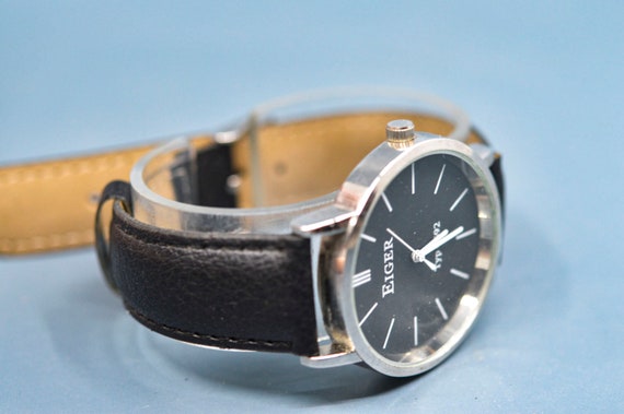 Eiger , steel tone with black dial, quartz wrist watch - Gem