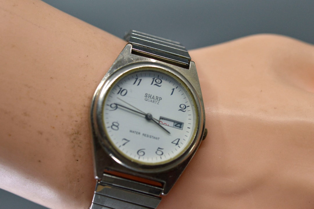 Sharp , Steel Tone With White Dial, Quartz Wrist Watch , Stretch ...