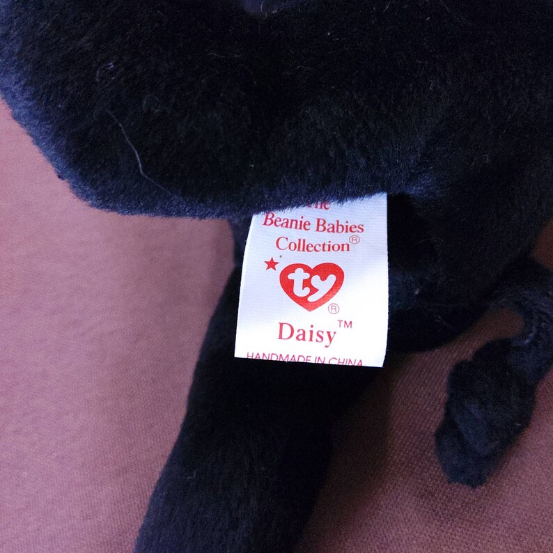 TY Beanie Baby "daisy" the Cow. New, Never Played With. Stored in a ...