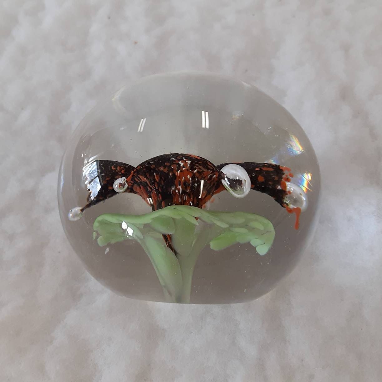 Round Glass Paperweight With Black and Orange Flower and Green | Etsy
