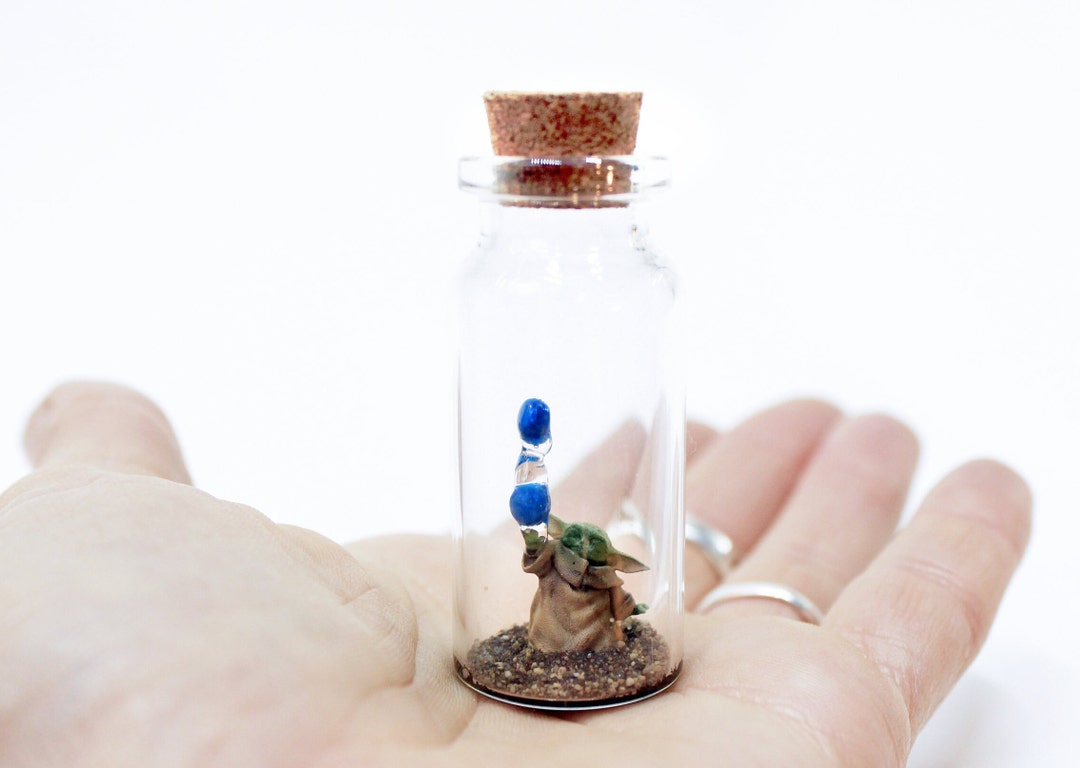 Cute Baby Yoda Miniature Grogu in a Bottle, Using the Force to Levitate ...