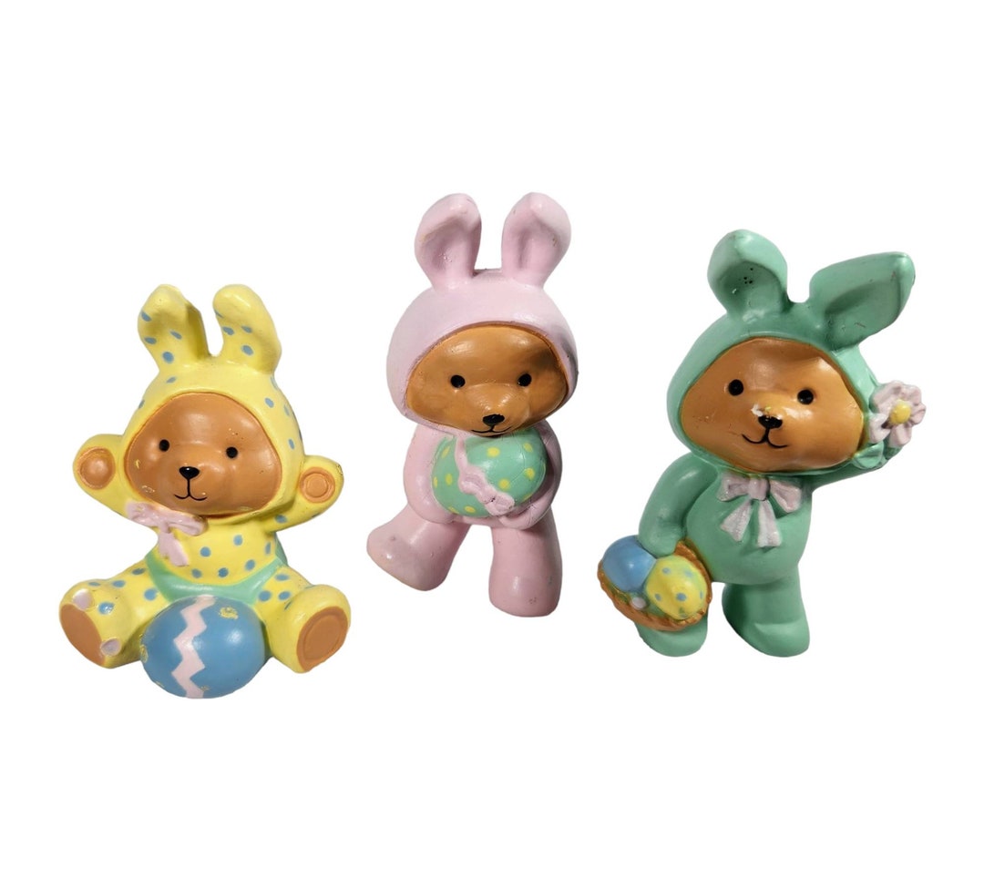 Teddy Bears Dressed in Easter Bunny Outfits With Colorful Easter Eggs ...