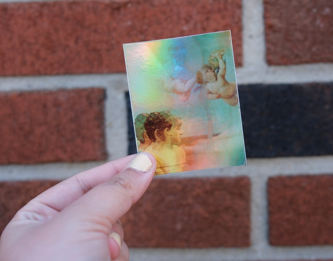 Cherubs and Eden • Durable Holographic Vinyl Sticker • Collage • Laptop Sticker ...