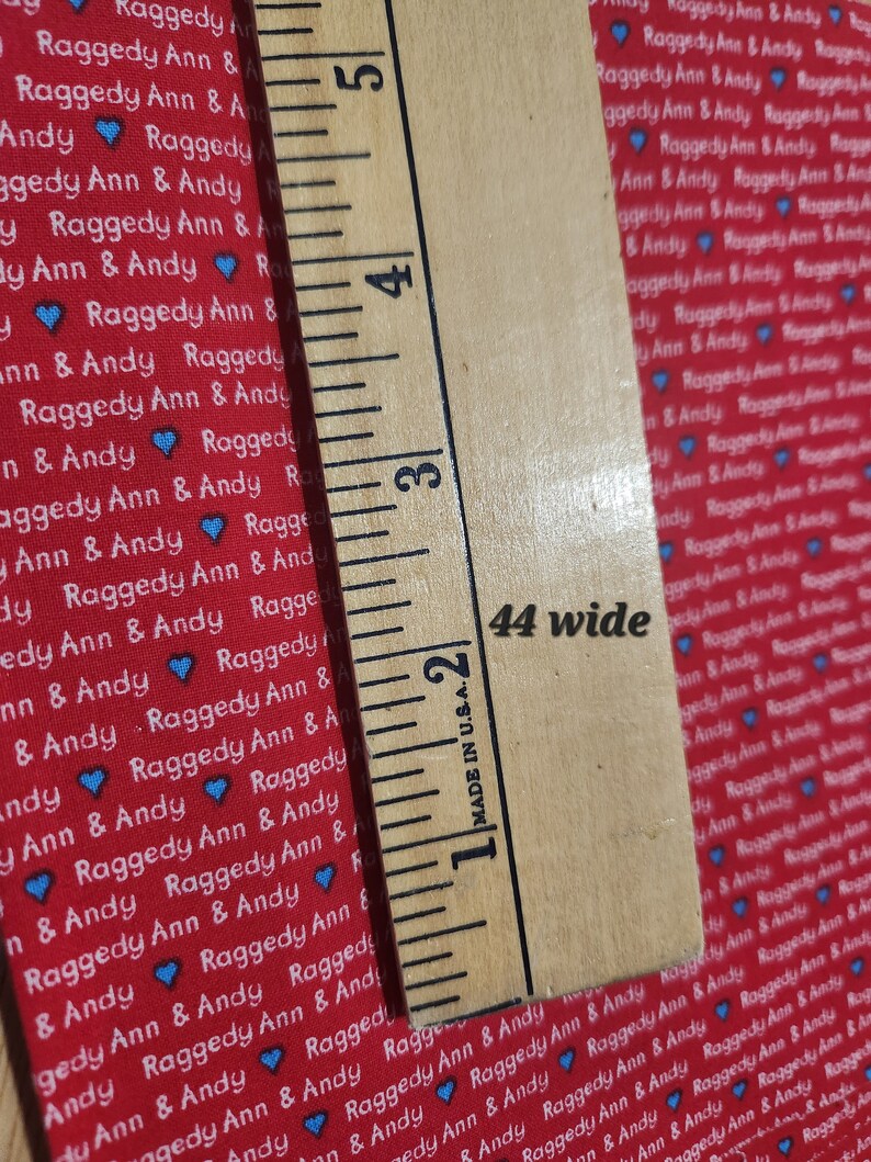 Raggedy Ann Andy ALLOVER WORDS DARK on Red, Daisy Kingdom 1753, Red ...