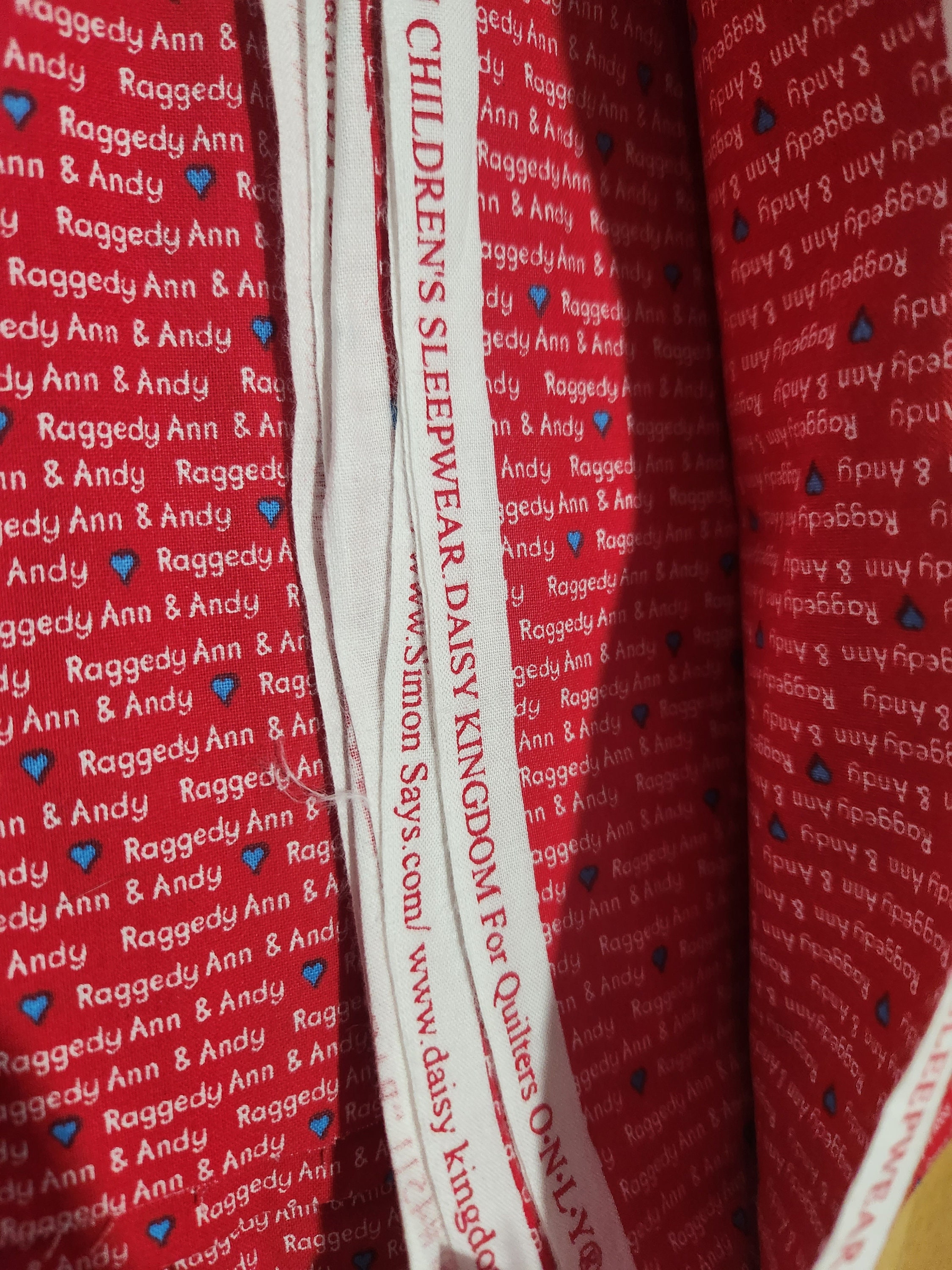 Raggedy Ann Andy ALLOVER WORDS DARK on Red, Daisy Kingdom # 1753, Red ...