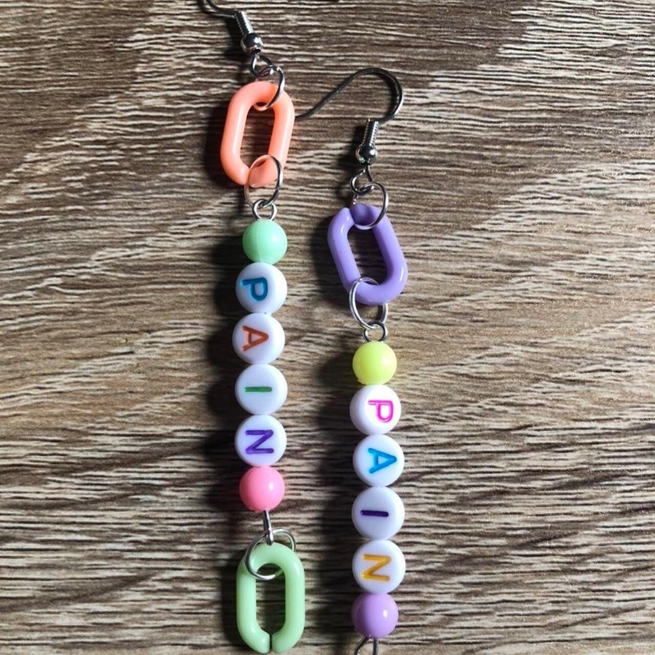 PAIN Earrings - Etsy