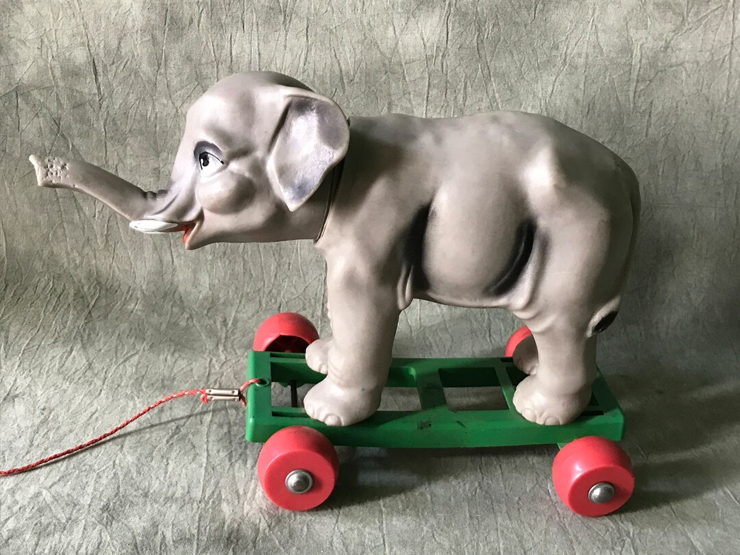 RARE Elephant on Wheels - Etsy
