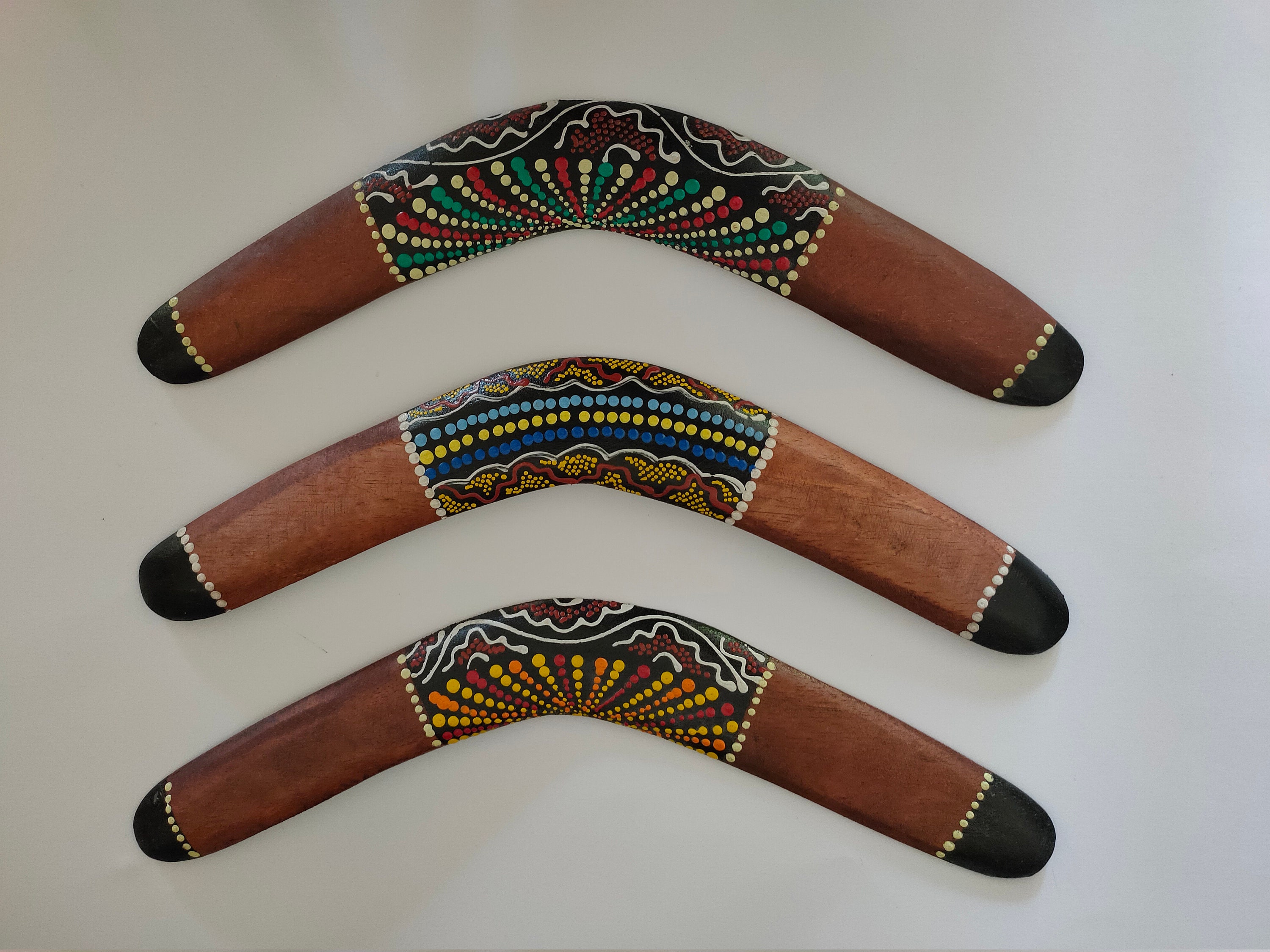 Wall hanging boomerang with raised dot painted decoration | Etsy