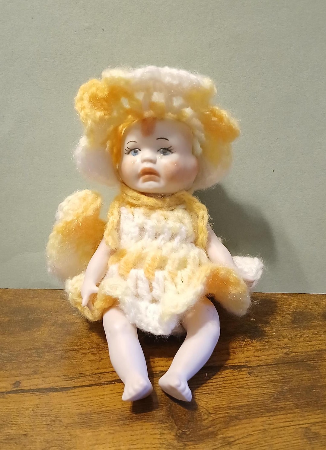 Rare Porcelain 3 Face Baby 7" Doll With Yellow and White Crochet Baby ...