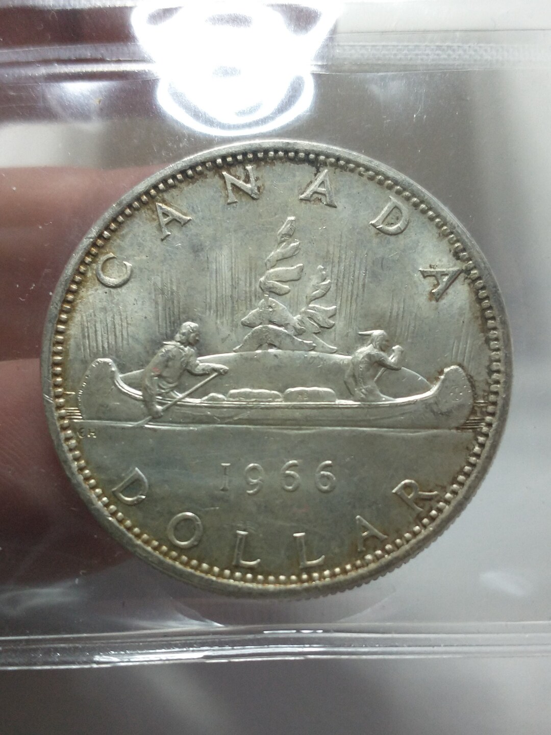 Canadian 1966 Silver Dollar. ICCS. Grade: MS65. Certificate# XWF 353 ...