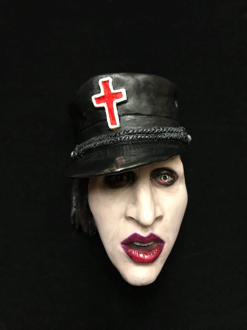 Collectible Figure of a Famous Musician is Made of Polyurethane Resin ...