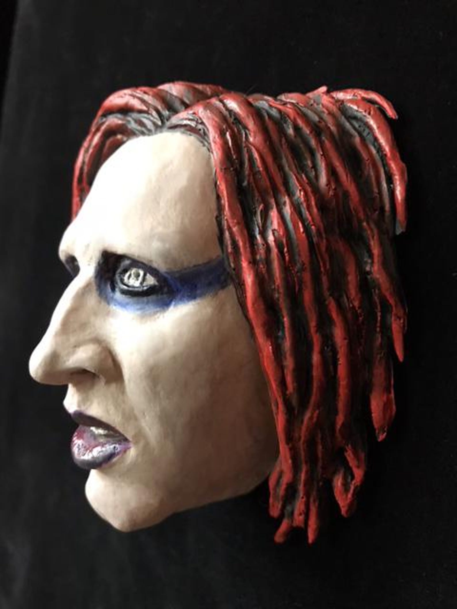 Collectible Figure of a Famous Musician is Made of Polyurethane Resin ...
