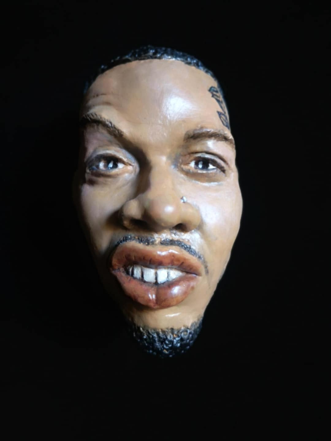 Collectible Figure of a Famous Musician. Sculpture of the Rap Artist ...