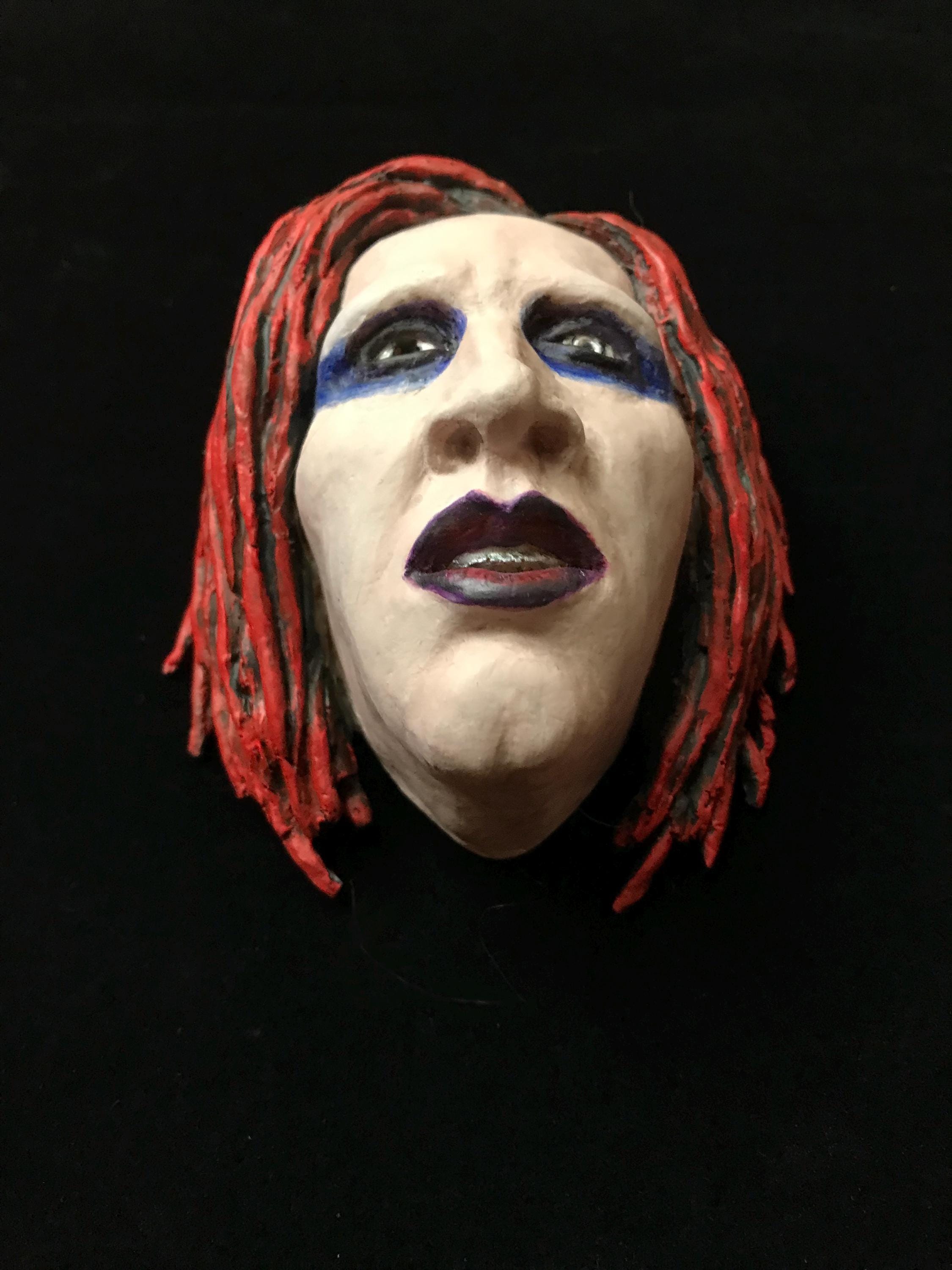 Collectible Figure of a Famous Musician is Made of Polyurethane Resin ...