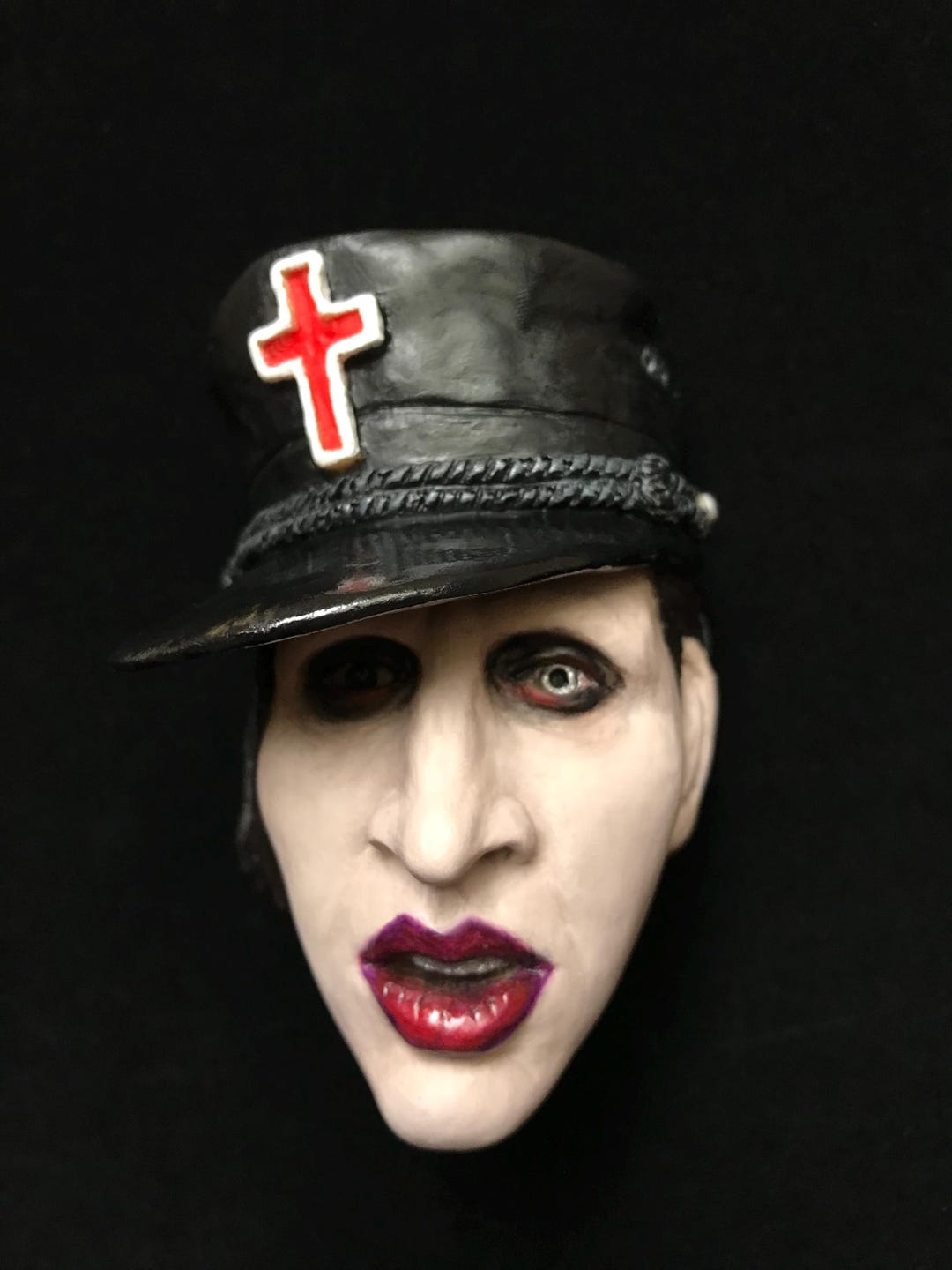 Collectible Figure of a Famous Musician is Made of Polyurethane Resin ...