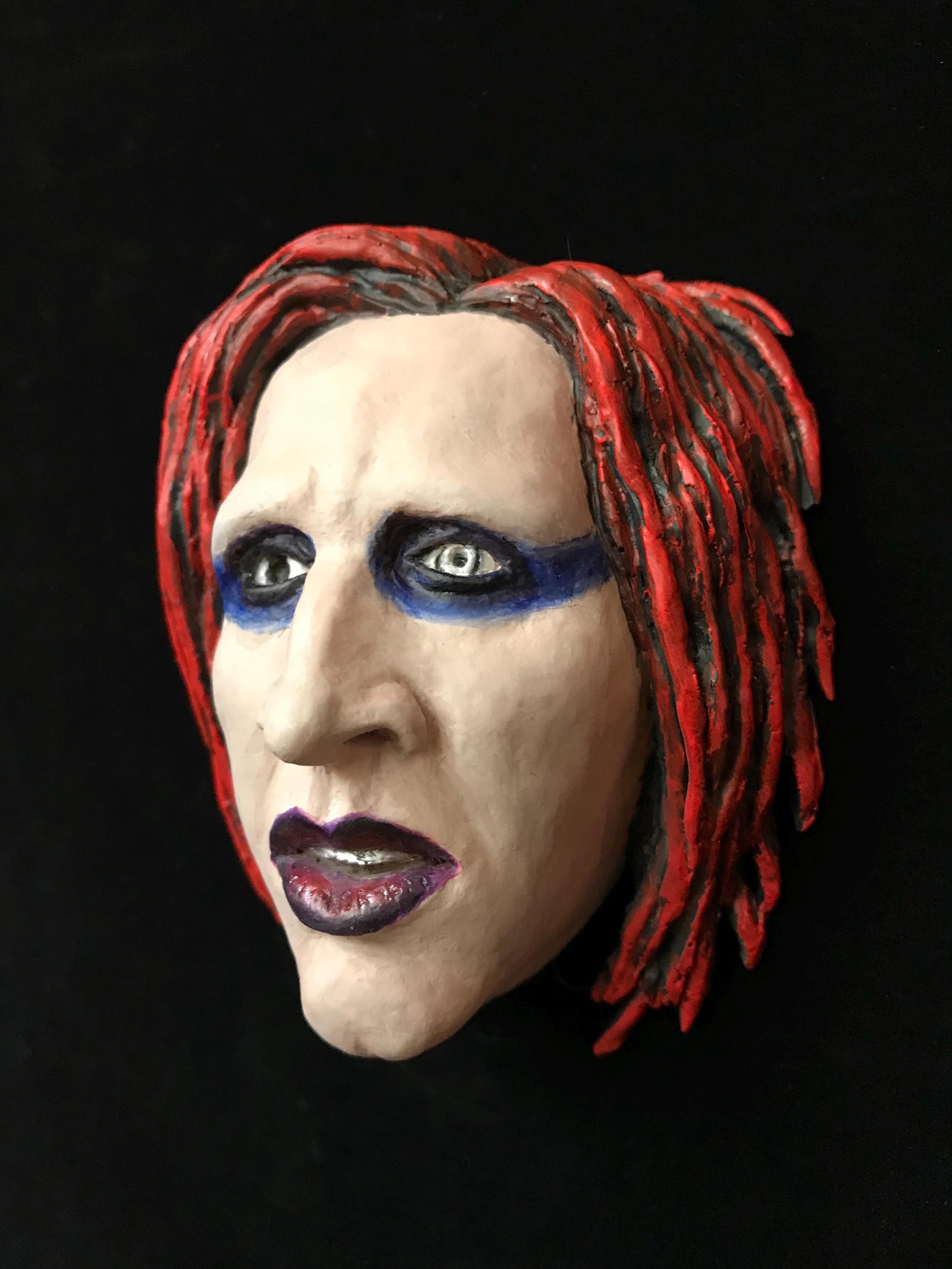 Collectible Figure of a Famous Musician is Made of Polyurethane Resin ...