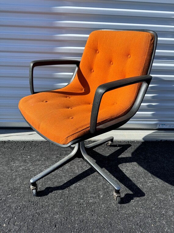Orange rolling chair store
