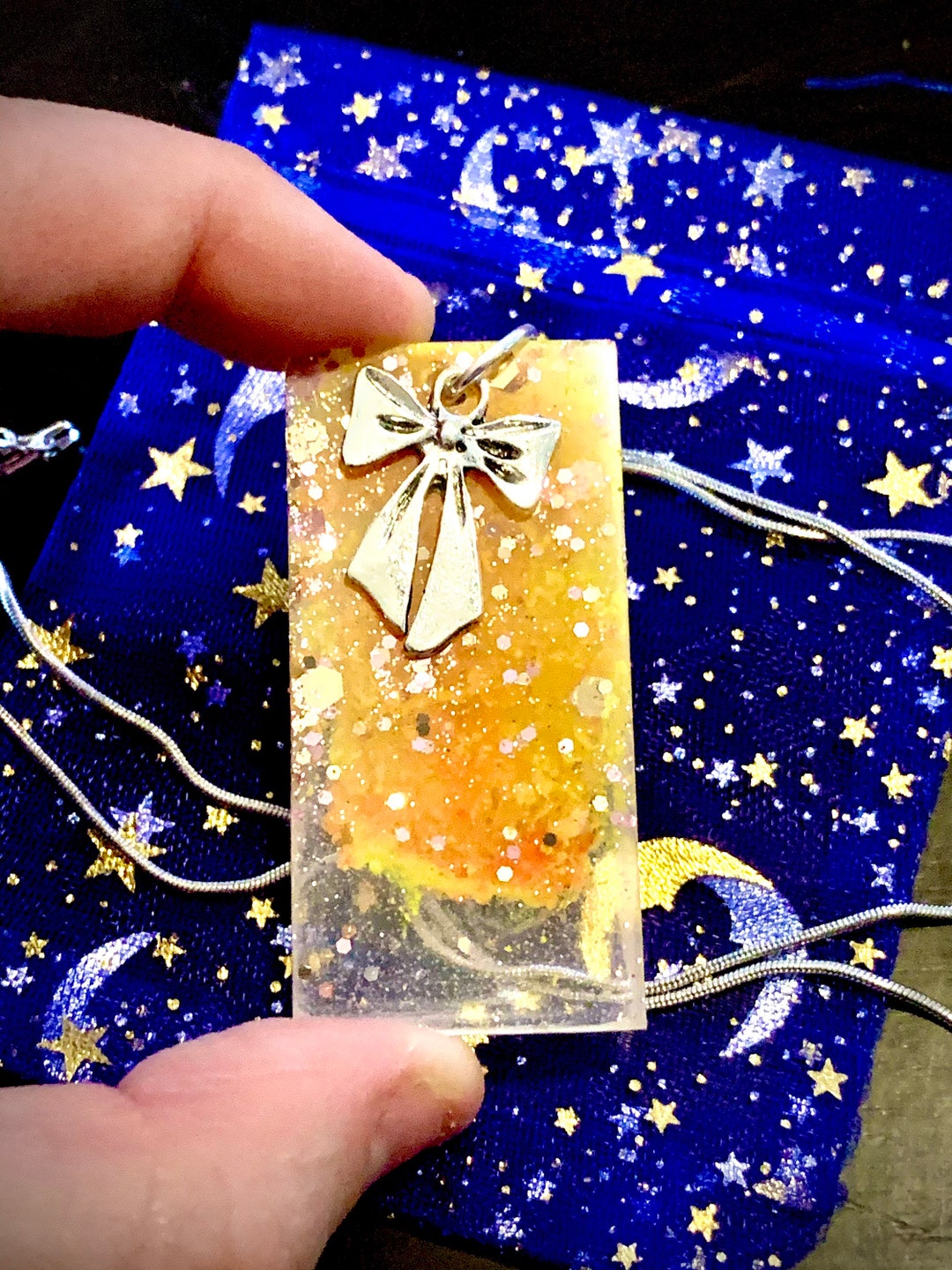 Yellow Sparkle Fade Resin Handcrafted Pendant With Silver Bow on 22 ...