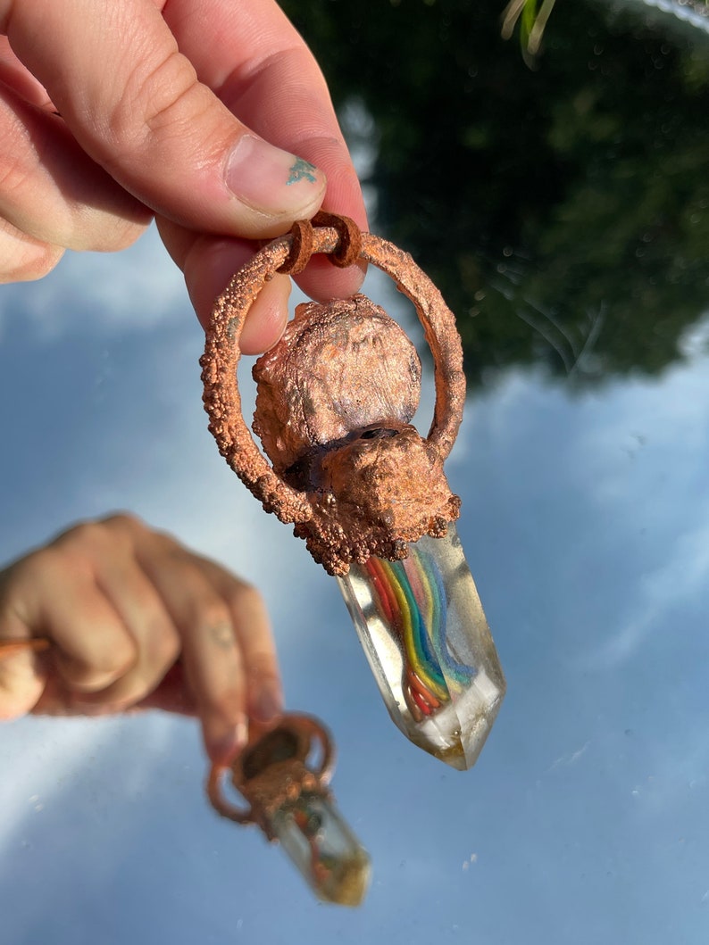 Copper Plated Amulet Featuring Ammonite and a Resin Crystal Filled With ...
