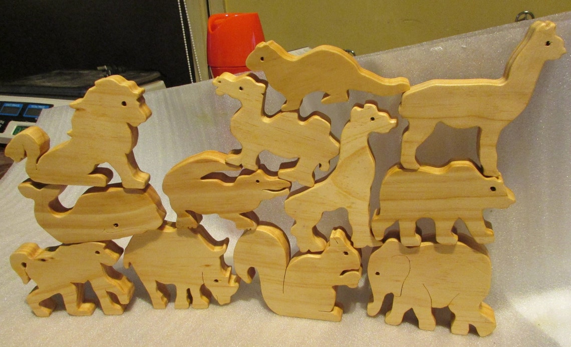 Wooden Animal shapes from around the worldHandmade set of 12 | Etsy