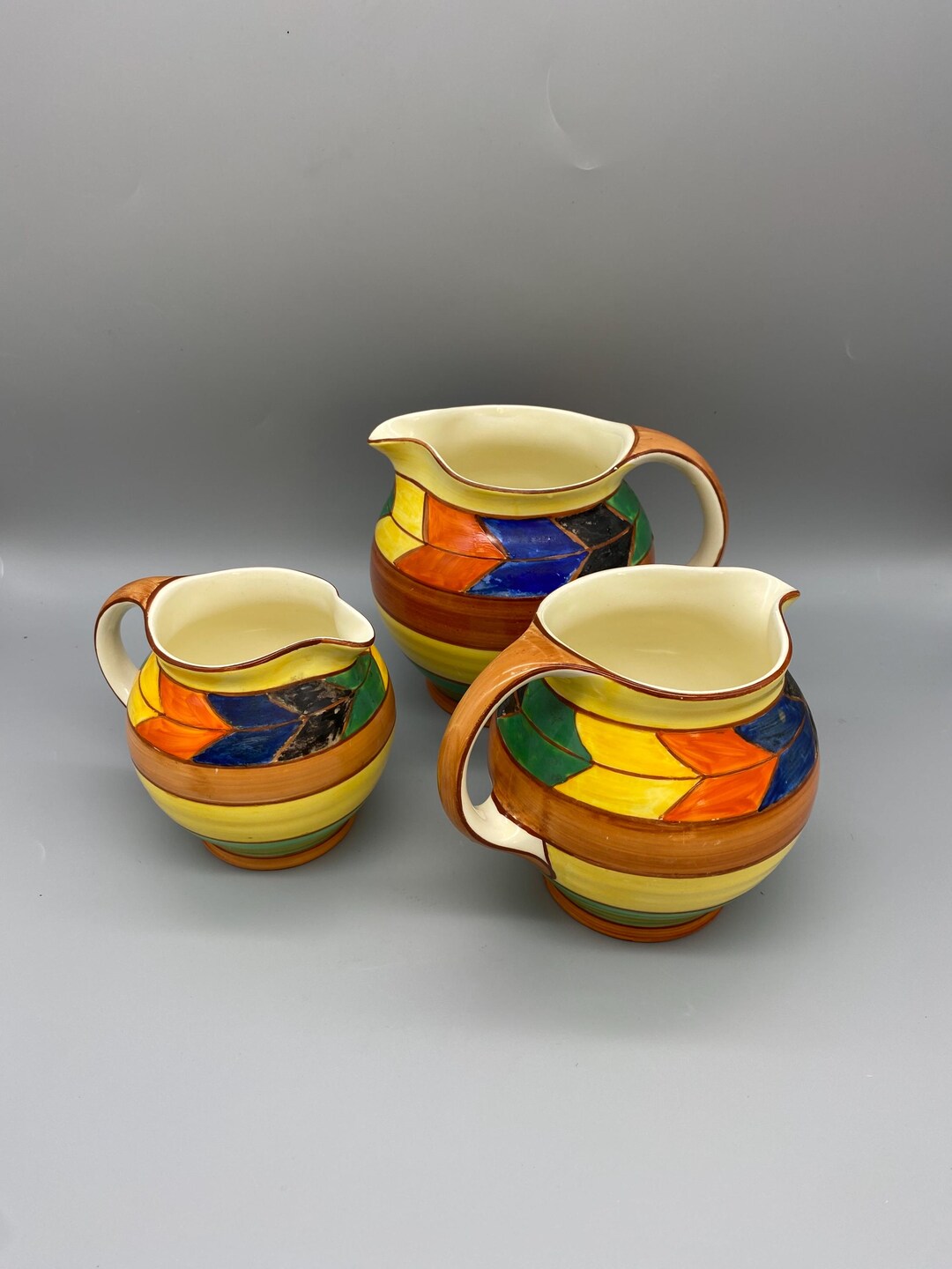 Crown Ducal - a Set of Geometric Design Graduated Globular Jugs ...