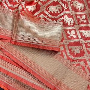 Gorgeous Peach Color Traditional Banarasi Silk Handloom Saree With ...