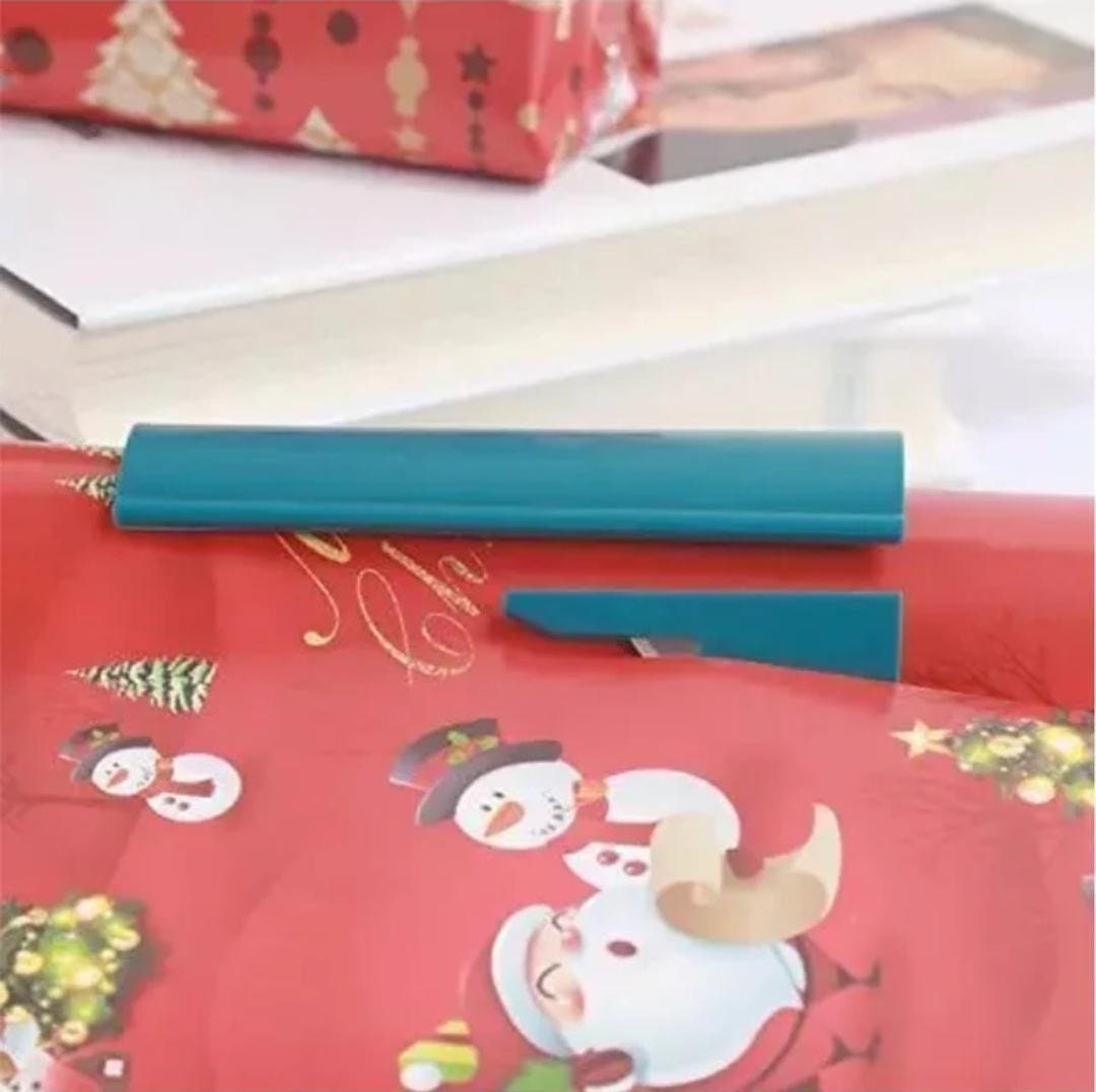 Wrapping Paper Tool - Unrolls, Cuts, and Keeps Wrapping Paper - ELF ...