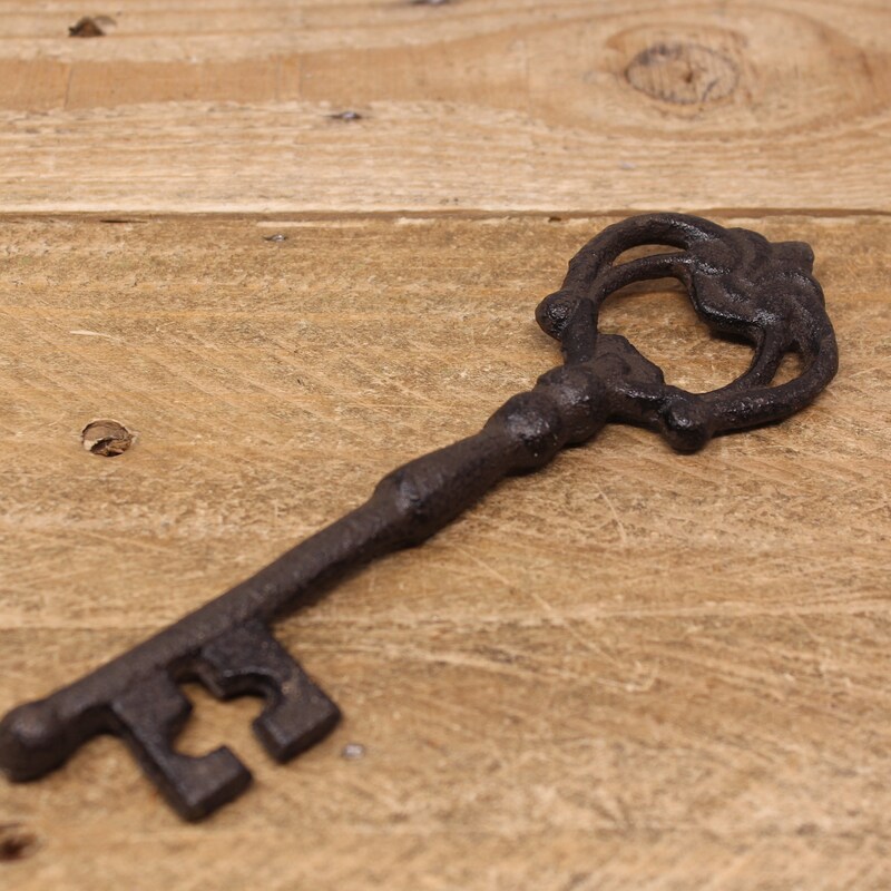 Cast Iron Opener - Etsy