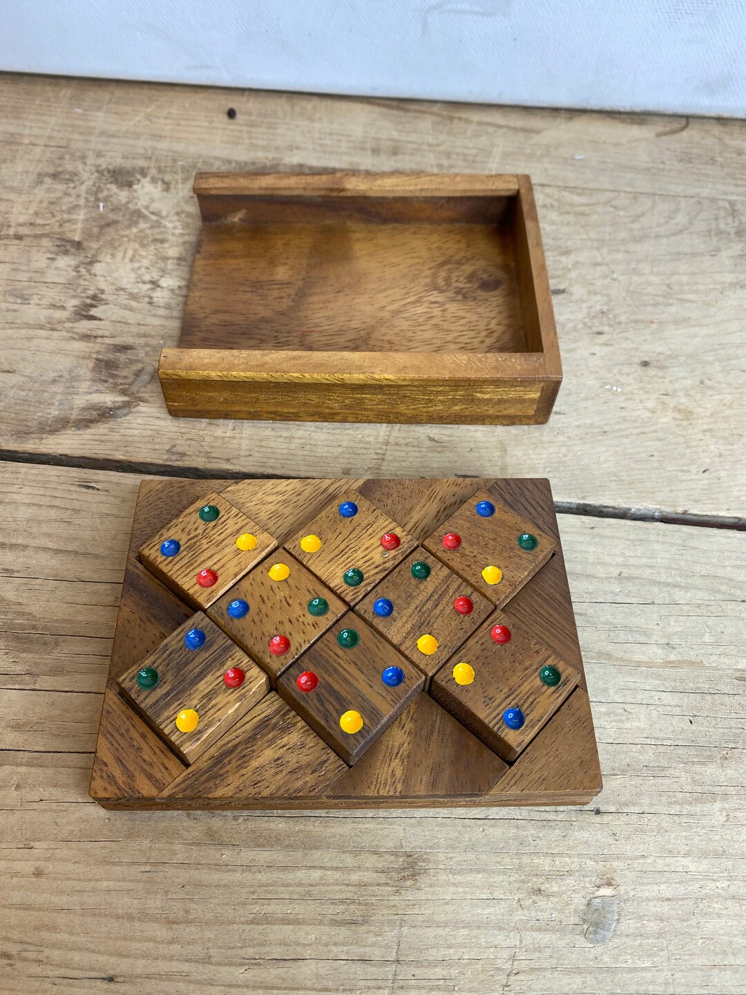 Vintage Wooden Dice Puzzle Brain Teaser Game. Bright Colourful Dice ...