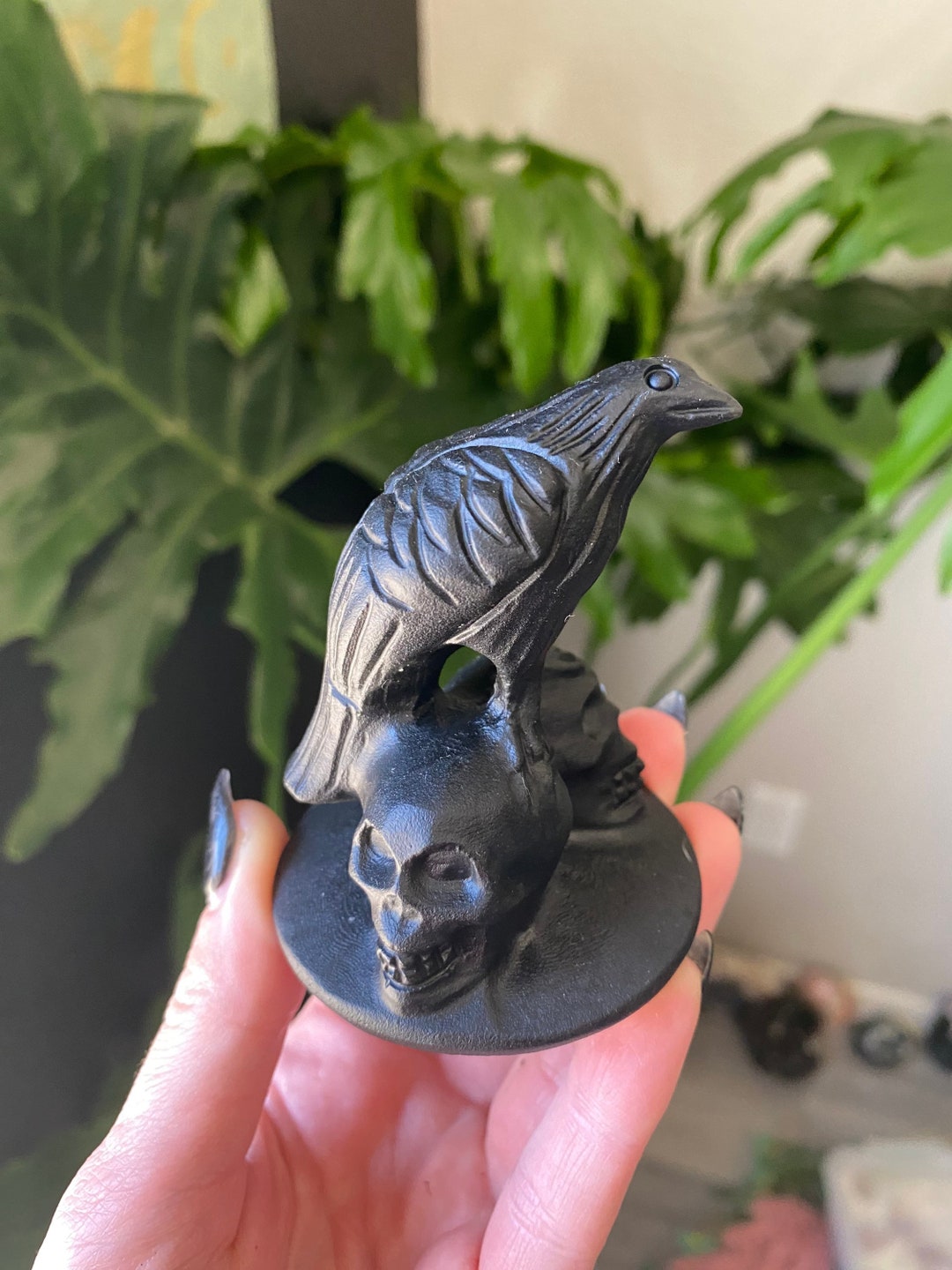 Black Obsidian Raven on Skulls Crystal | Black Obsidian Crow | Crystal ...