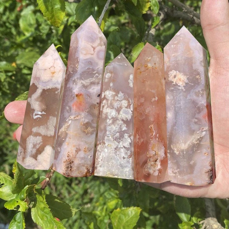Healing stones and wands Crystal Points Blossom Agate towers Rocks ...
