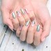 Stunner Made With Genuine Swarovski Crystals Round Medium Length Press ...