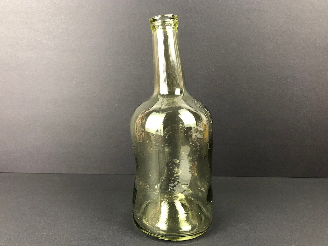 A 1960s Vintage Duff Gordon Cream Sherry Glass Bottle With the Very ...