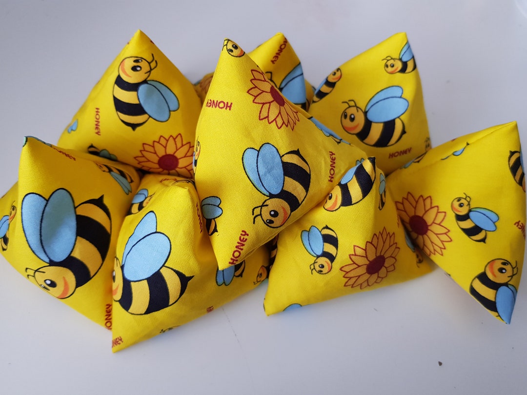 8 X Pyramid Pattern Weights. Yellow Material With Varying Sized Bees ...
