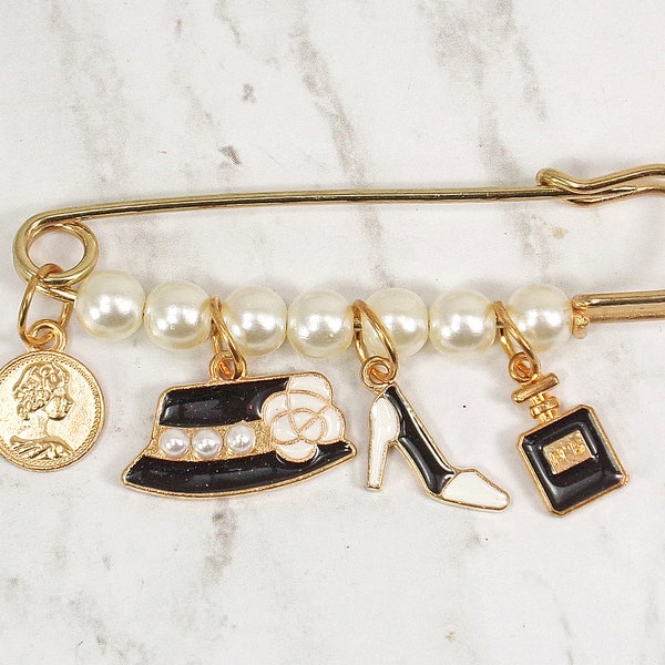 Safety Pin With Beads On Shoes Image