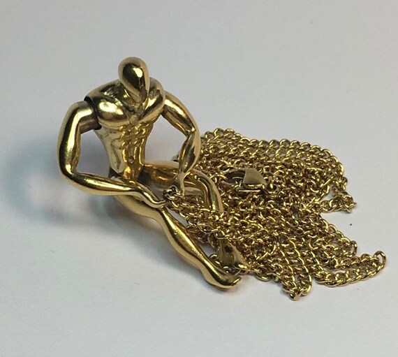 Rare! Gold-plated bodybuilder puppet pendant from the… - Gem