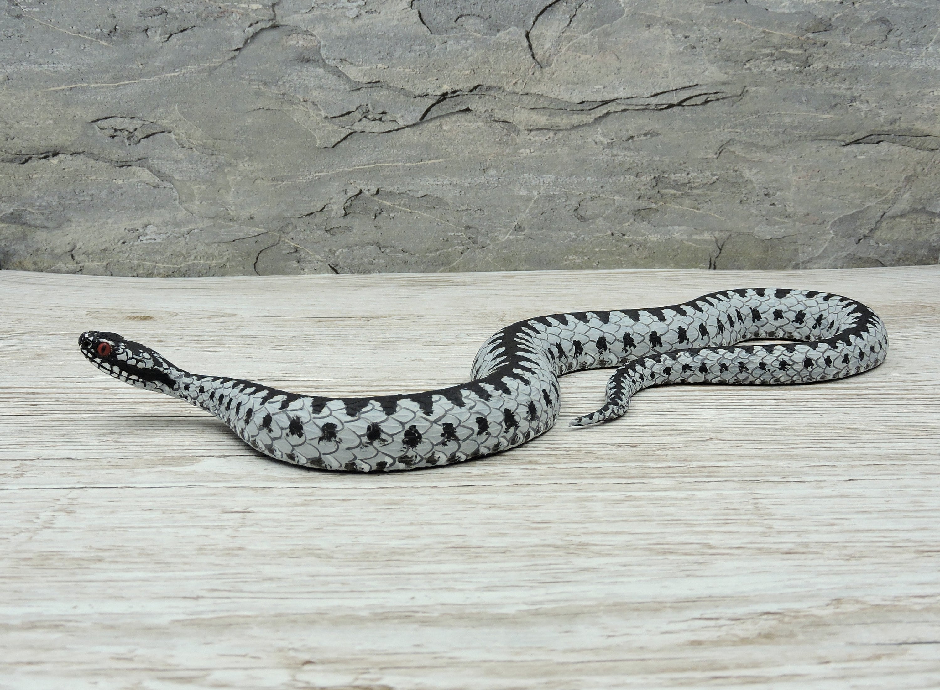 A Sculpture of a Common European Viper, Vipera Berus, a Wooden Snake ...