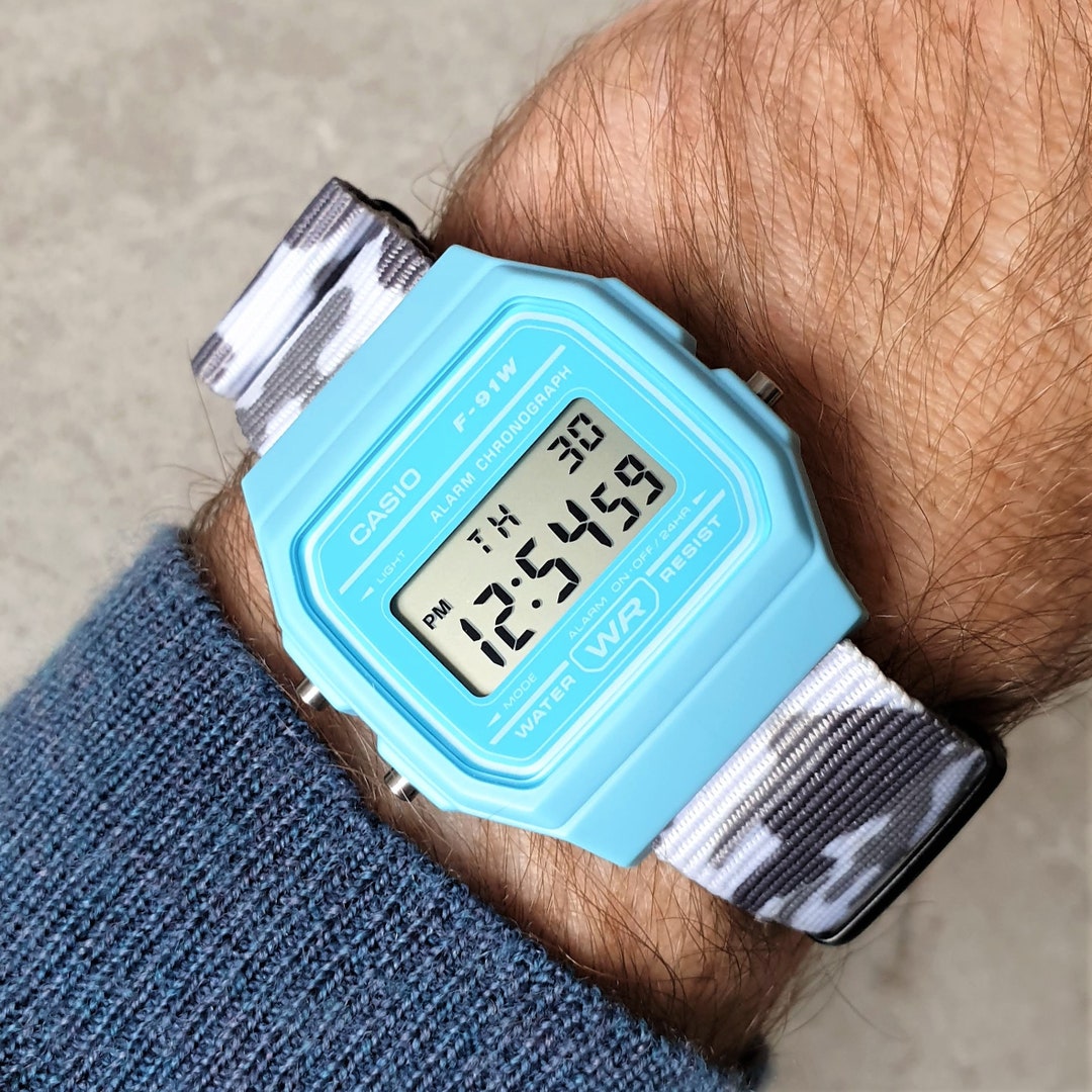 Casio Watch (light Blue) on Grey and White Snow Camo Nylon Strap, the ...